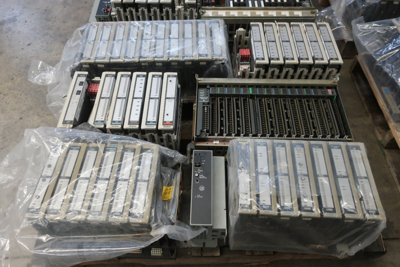4 PALLETS OF ASSORTED MODULES, CHASSIS, AND POWER SUPPLIES