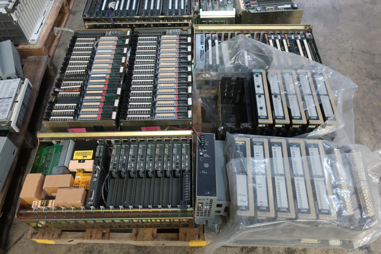 4 PALLETS OF ASSORTED MODULES, CHASSIS, AND POWER SUPPLIES