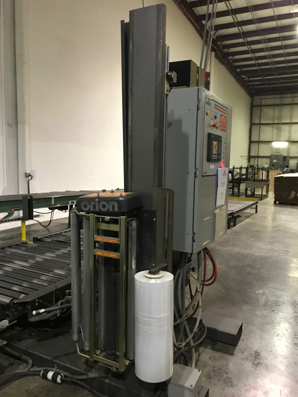 Fully Automatic Stretch wrapper with 15 ft powered infeed & rollers