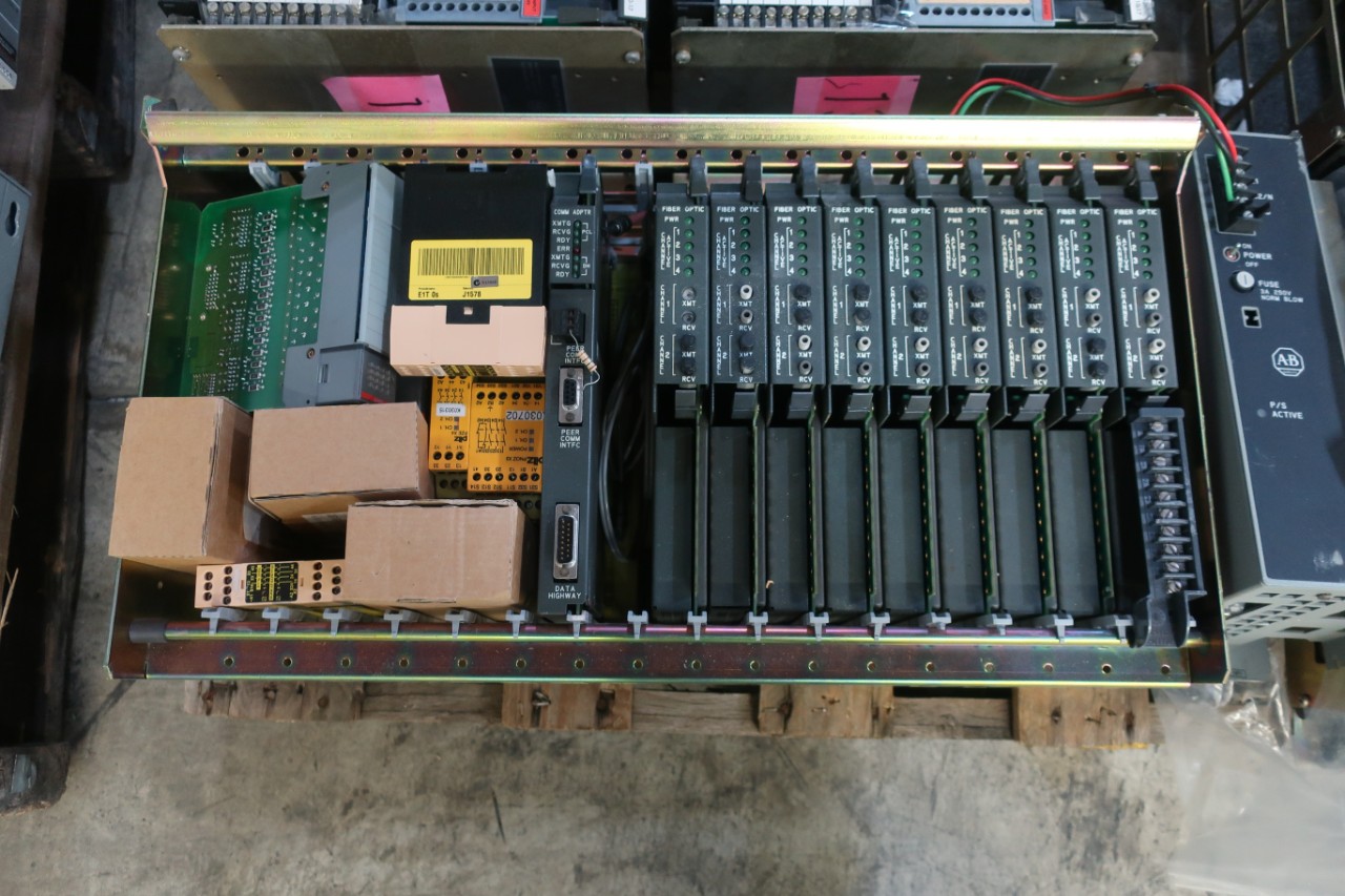 4 PALLETS OF ASSORTED MODULES, CHASSIS, AND POWER SUPPLIES