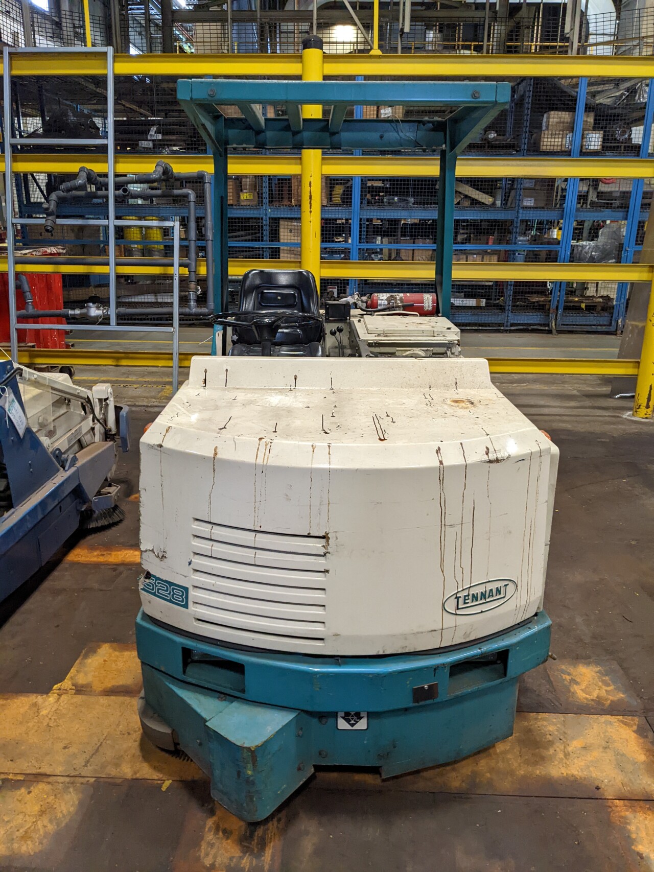 INDUSTRIAL RIDE ON SWEEPER, 66-INCH CLEANING PATH, OVERHEAD CAGE