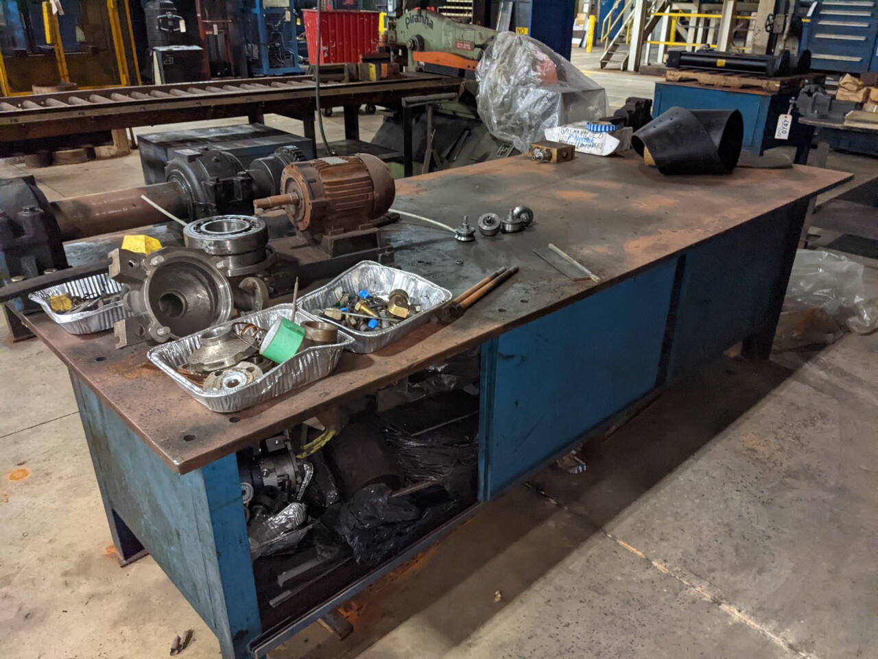 INDUSTRIAL STEEL WORK TABLE WITH CONTENTS, TABLE VISE, PARTS ON TOP NOT ...