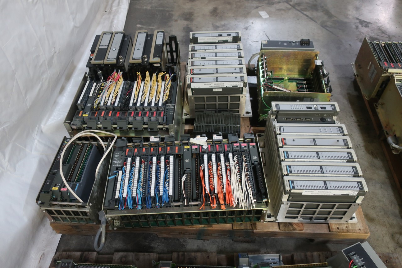 4 PALLETS OF ASSORTED MODULES, CHASSIS, AND POWER SUPPLIES